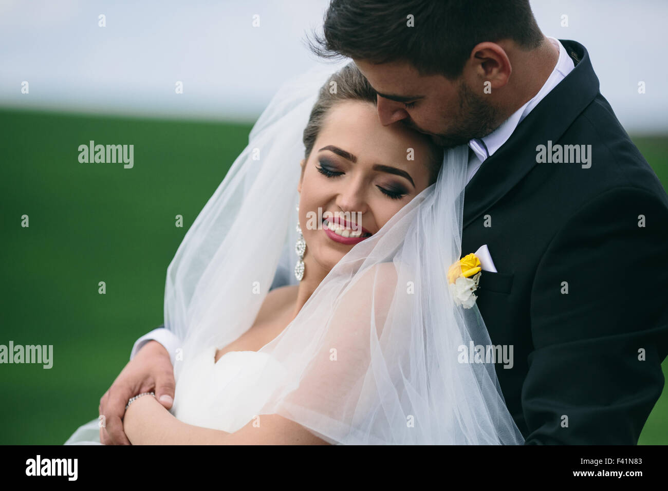 Beautiful wedding couple on nature Stock Photo - Alamy