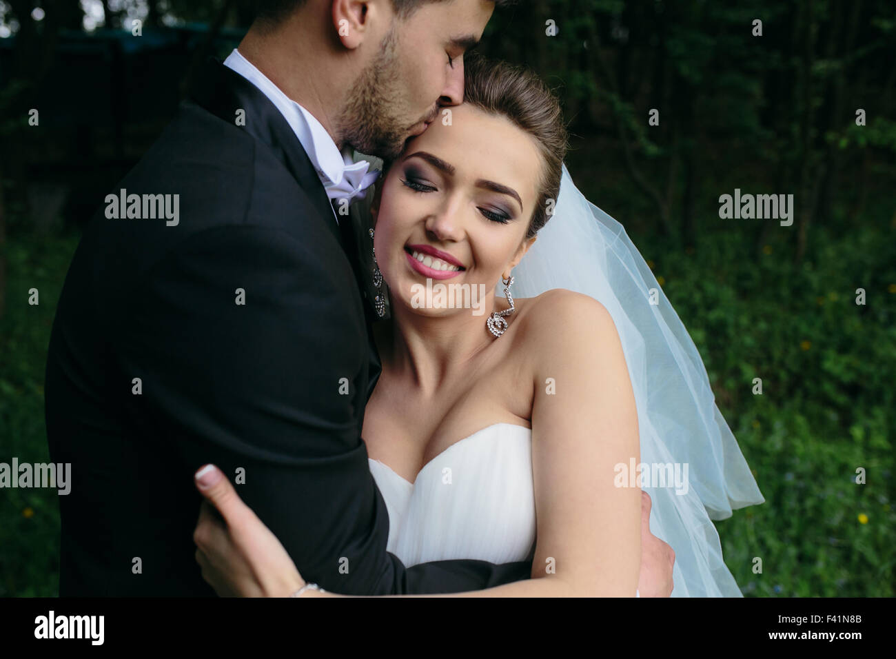 Beautiful wedding couple on nature Stock Photo - Alamy