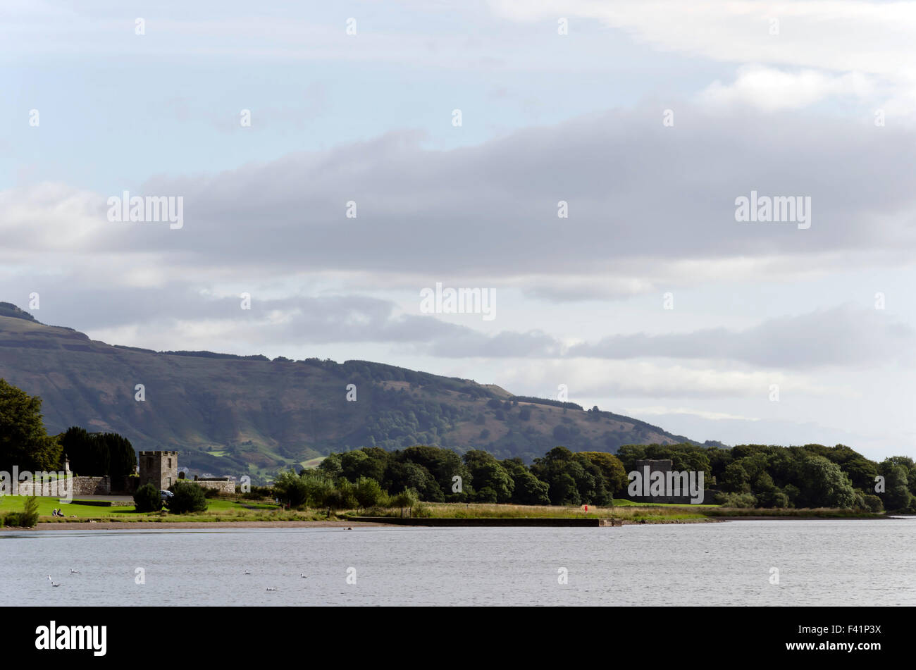 The old Kinross graveyard with Loch Leven Castle Island beyond, in ...