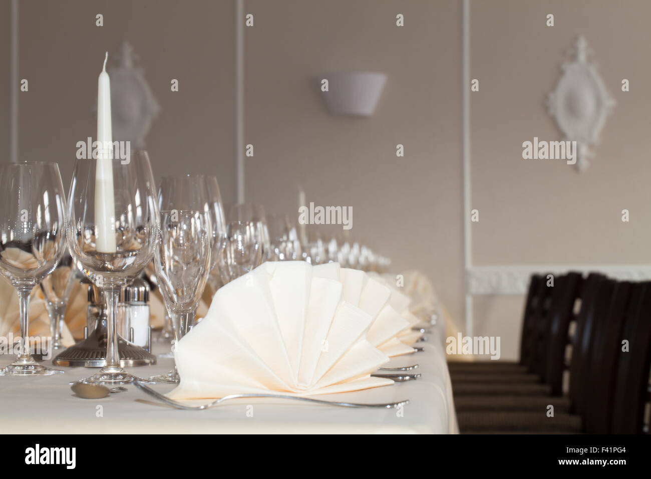 Table setting with candles Stock Photo - Alamy