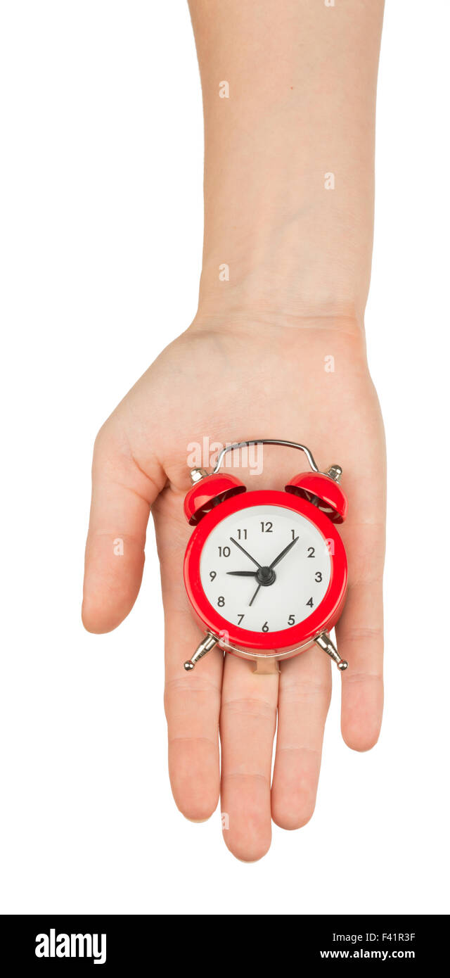 Alarm clock on humans hand Stock Photo - Alamy