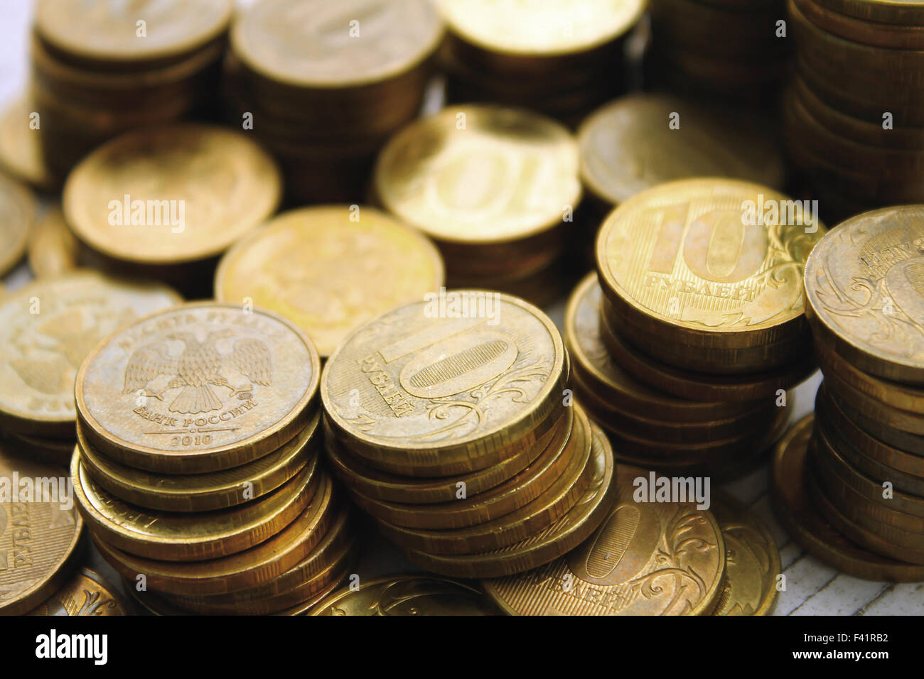 A stacks of gold coins Stock Photo - Alamy