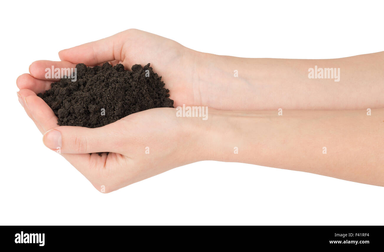 Heap of ground in humans hands Stock Photo - Alamy