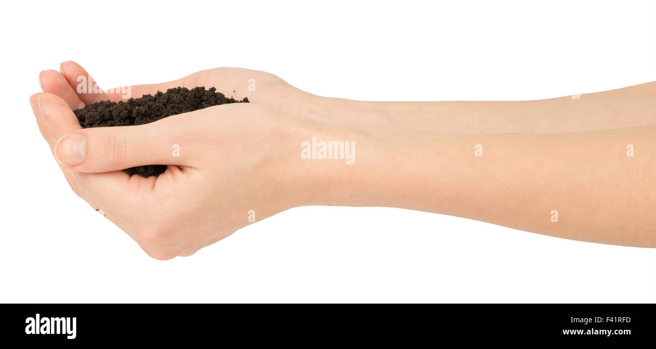Ground in humans hands, side view Stock Photo - Alamy