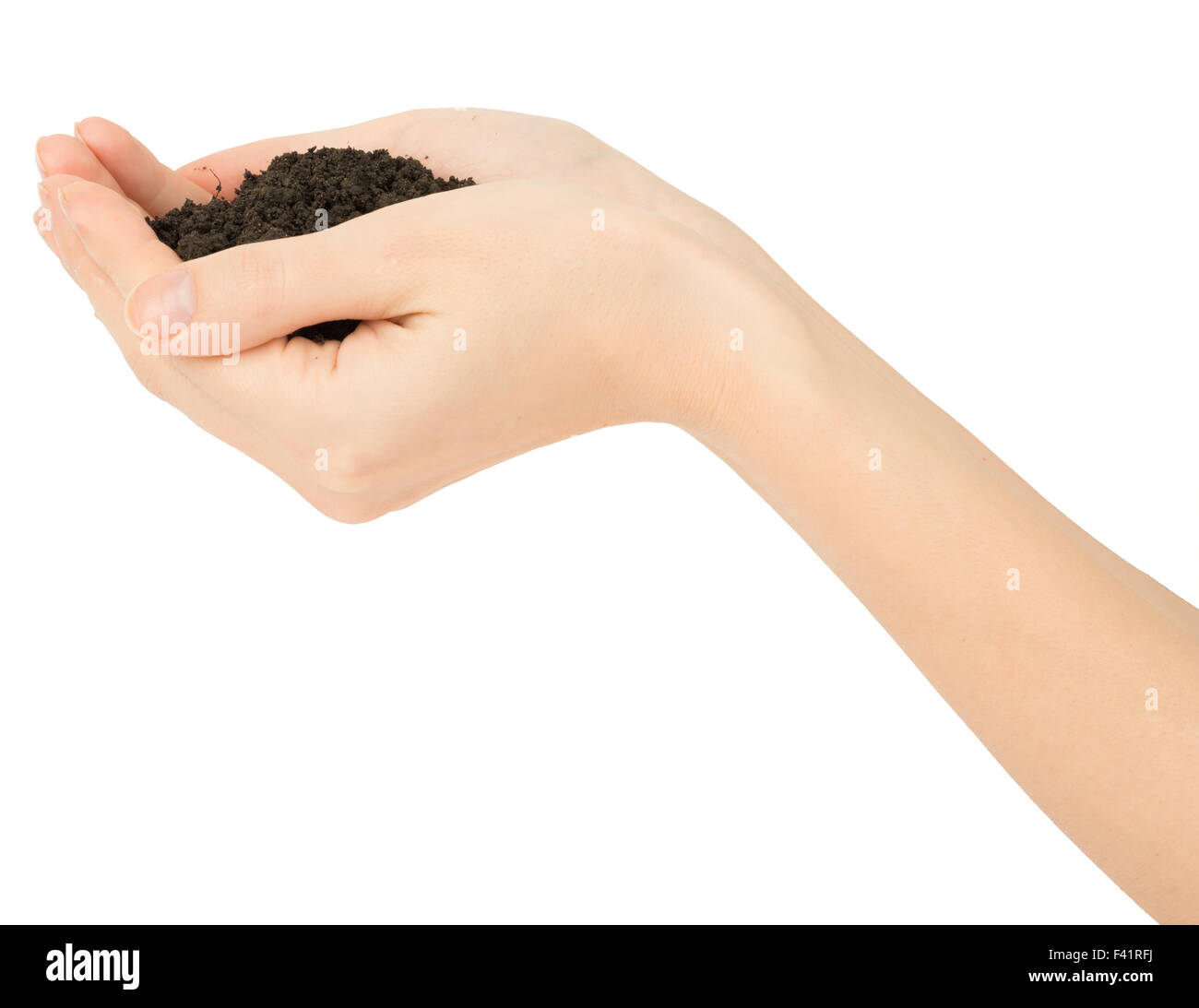 Ground in hands Stock Photo - Alamy
