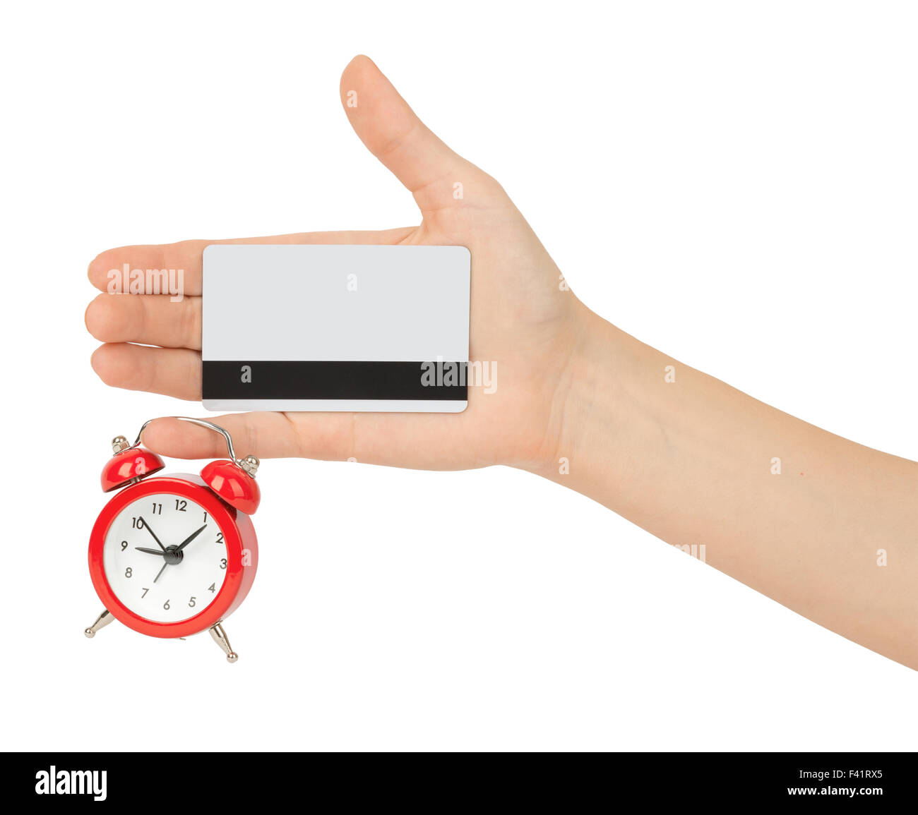 Empty credit card and alarm clock in humans hand Stock Photo - Alamy