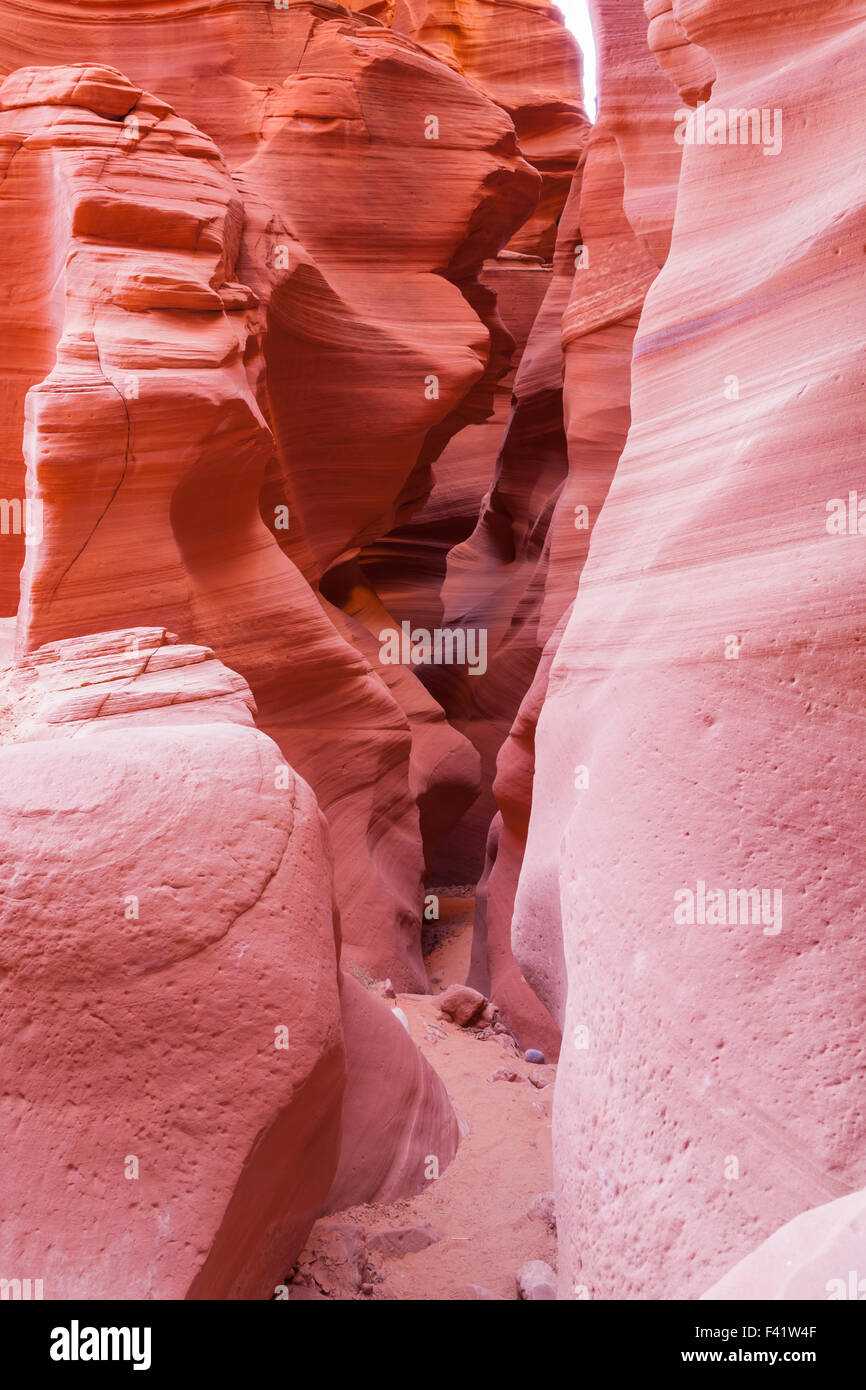 The narrow opening of Canyon X in Page, Arizona, showing the smooth ...