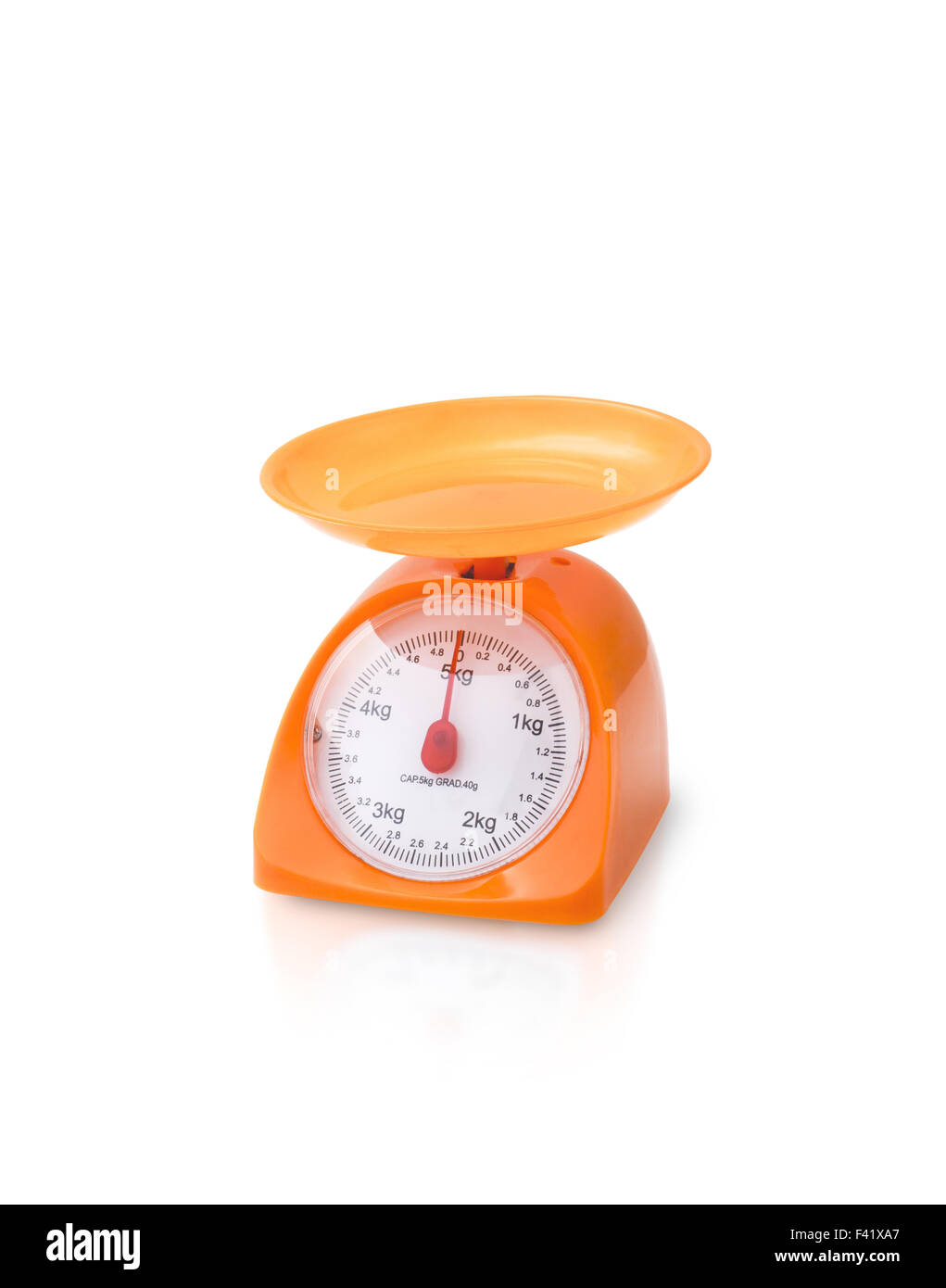 orange color kitchen scale isolated on white background Stock Photo - Alamy
