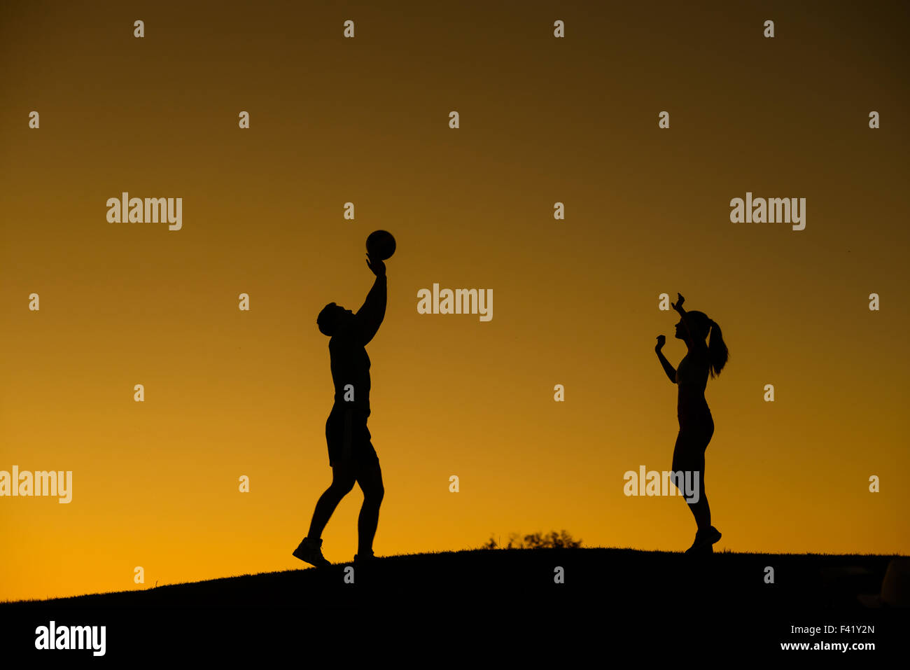 Silhouette figure of volleyball players Stock Photo - Alamy