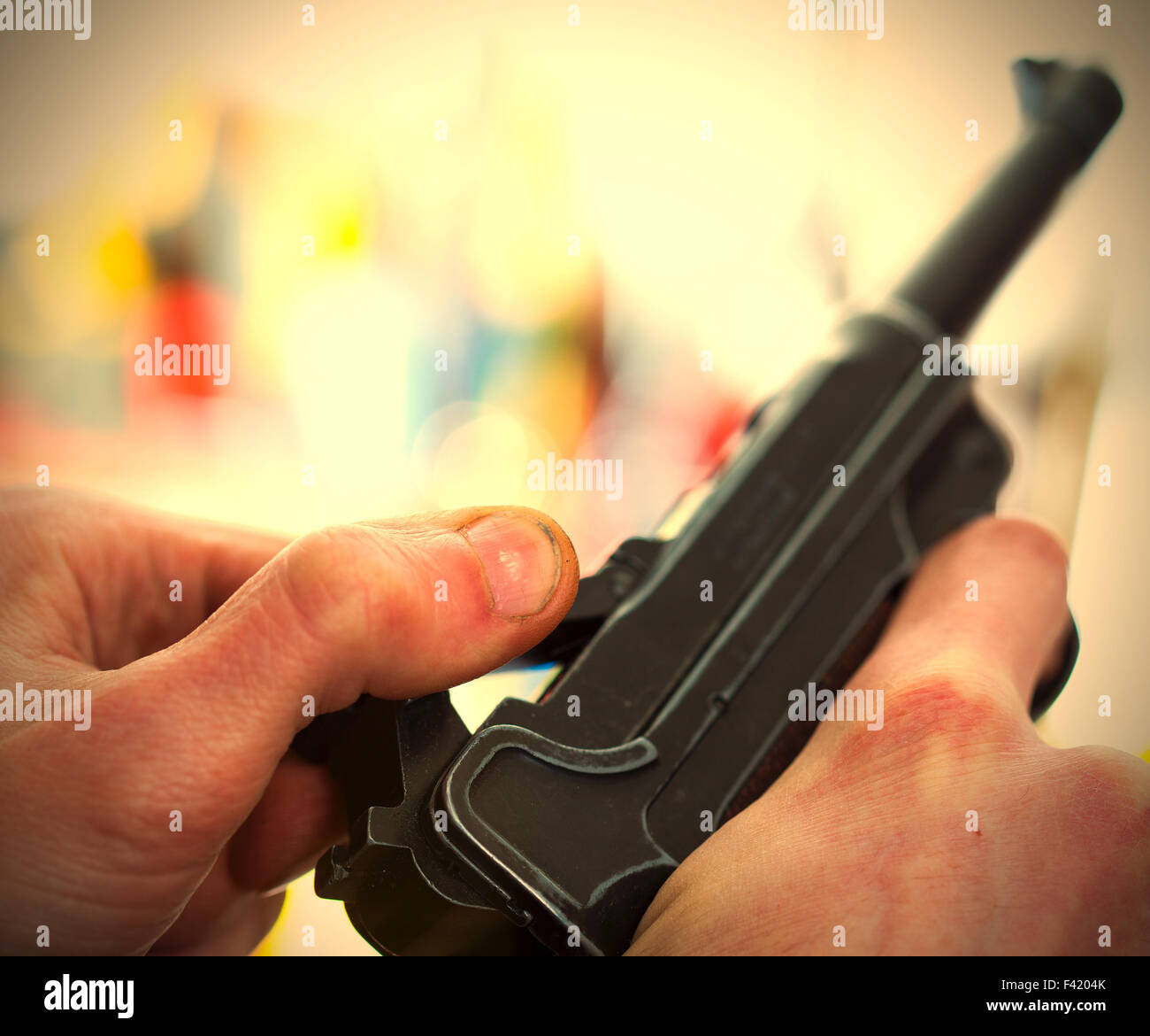 Luger automatic pistol in a human hands Stock Photo - Alamy