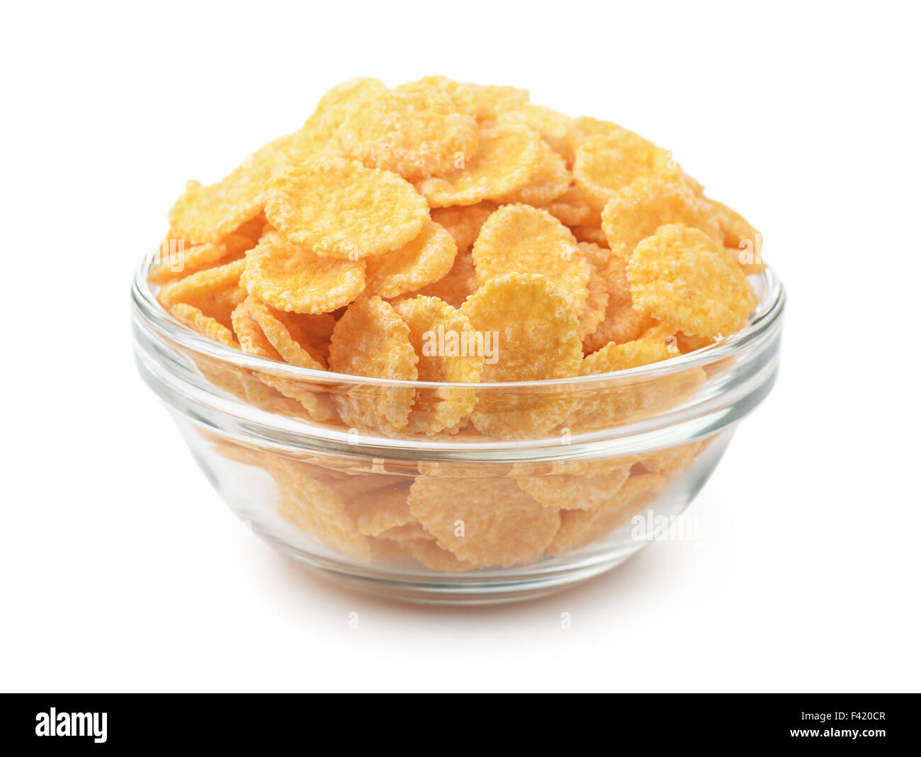 Glass bowl of cornflakes isolated on white Stock Photo - Alamy