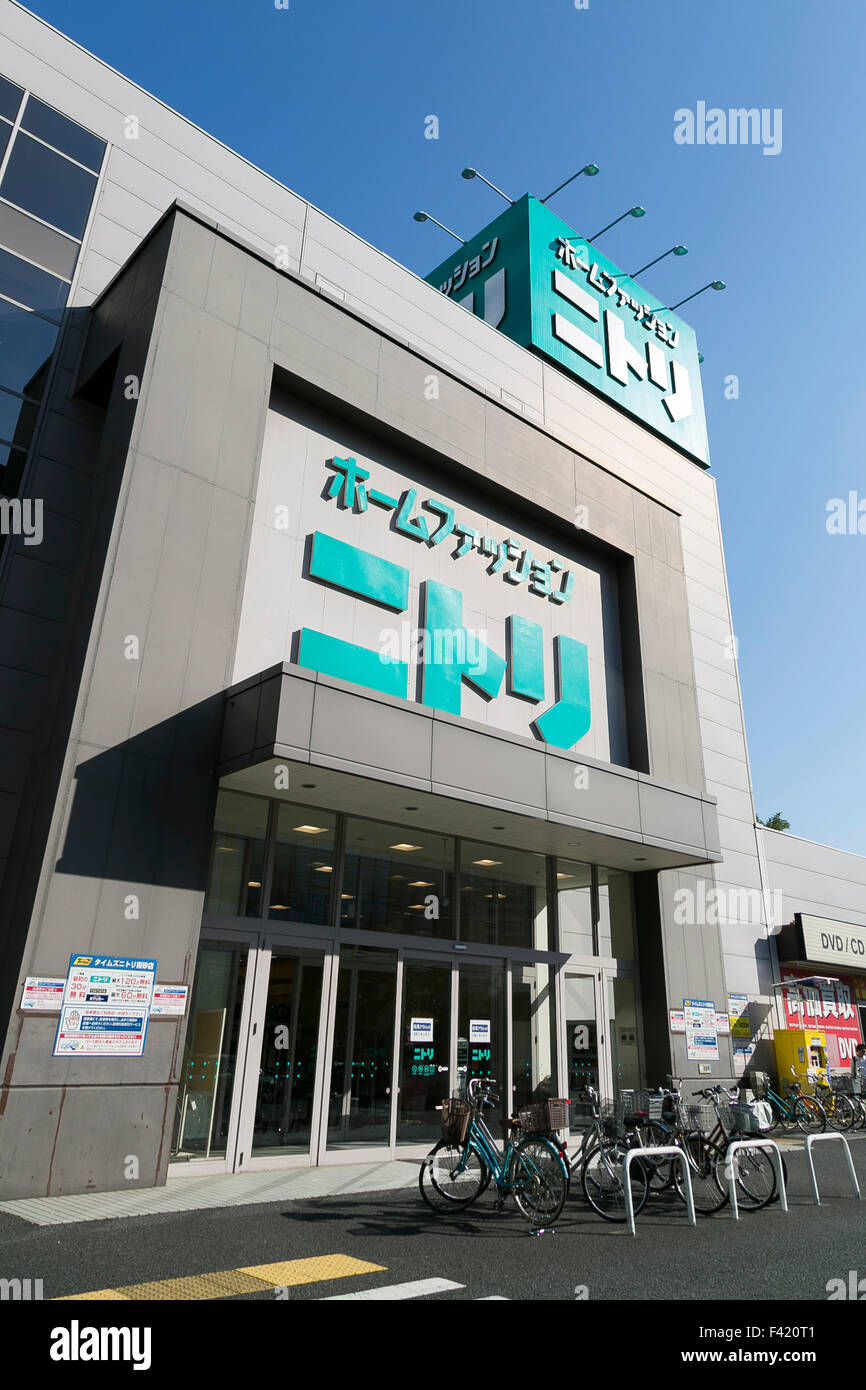 Nitori signboards on display at the entrance of its store in Minami ...