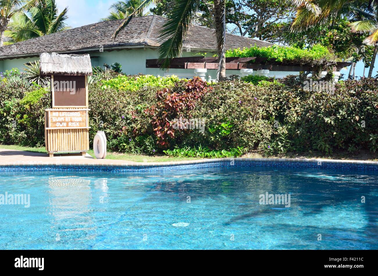 Hotel swimming pool and hut Stock Photo - Alamy