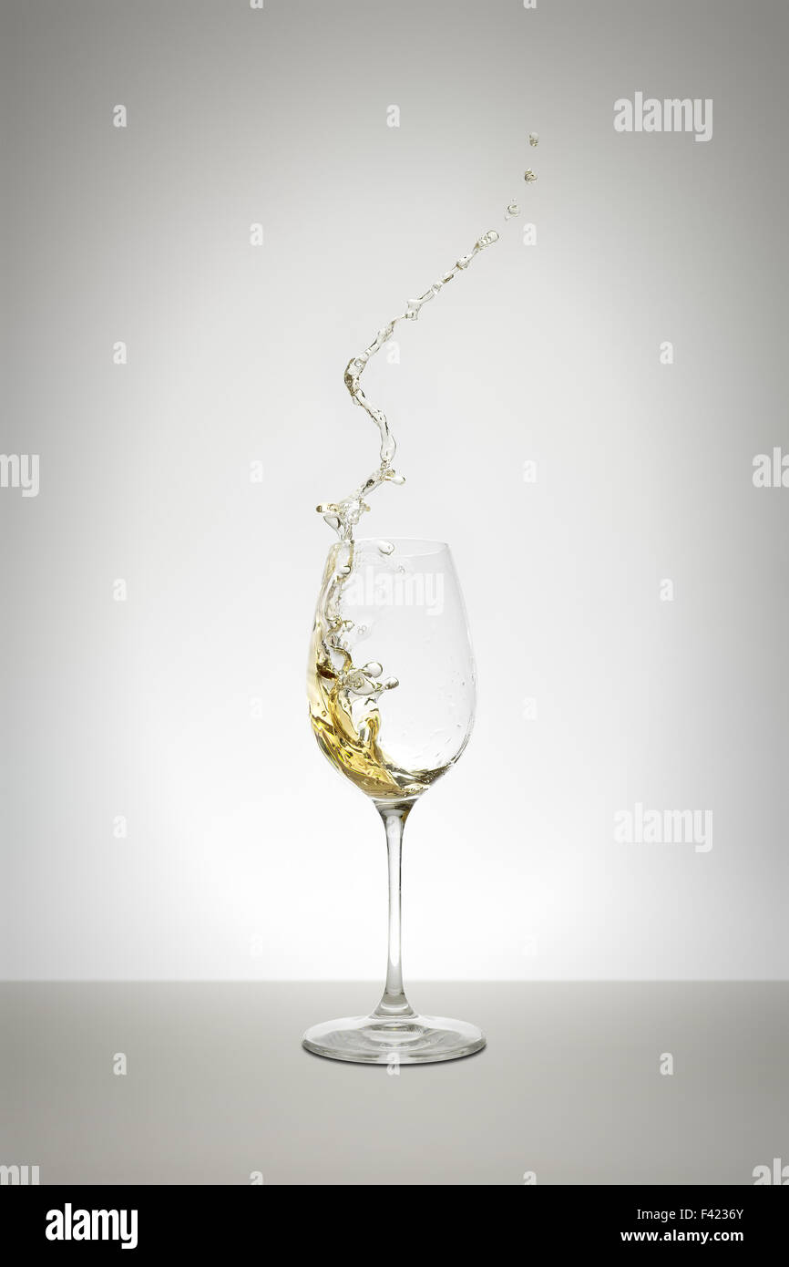 white wine splash Stock Photo - Alamy