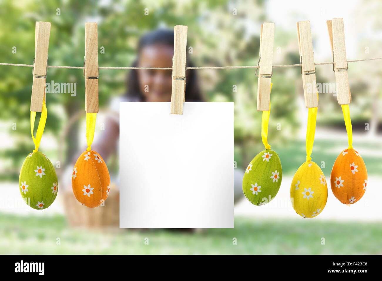 Composite image of hanging easter eggs Stock Photo - Alamy