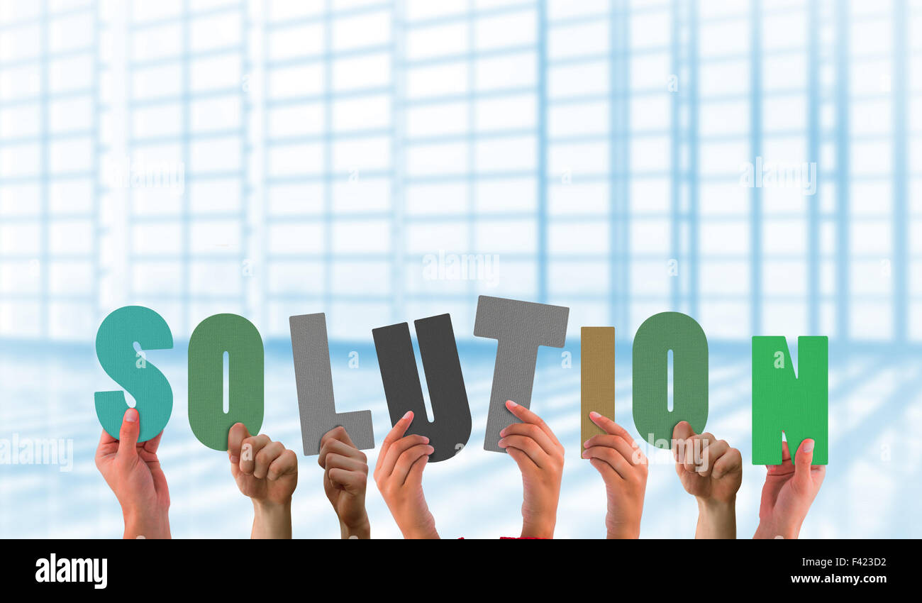 Composite image of hands holding up solution Stock Photo - Alamy