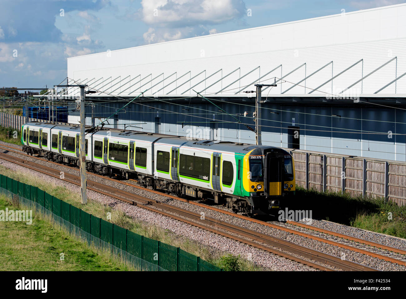 London Midland class 350 train passing DIRFT 2, Northamptonshire ...