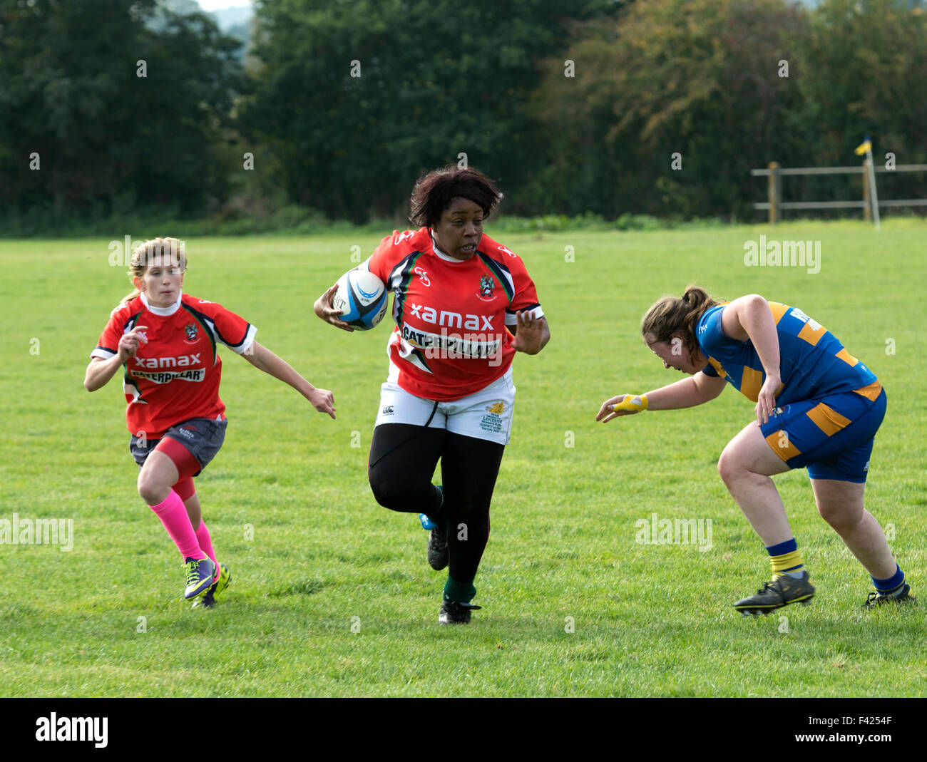 Girls playing with rugby ball hi-res stock photography and images - Alamy