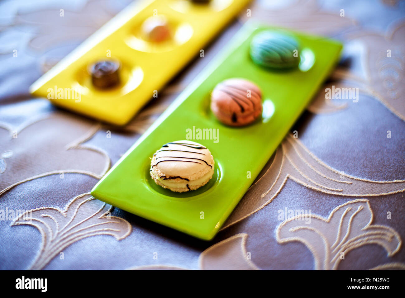 Colorful macarons served in bed Stock Photo - Alamy