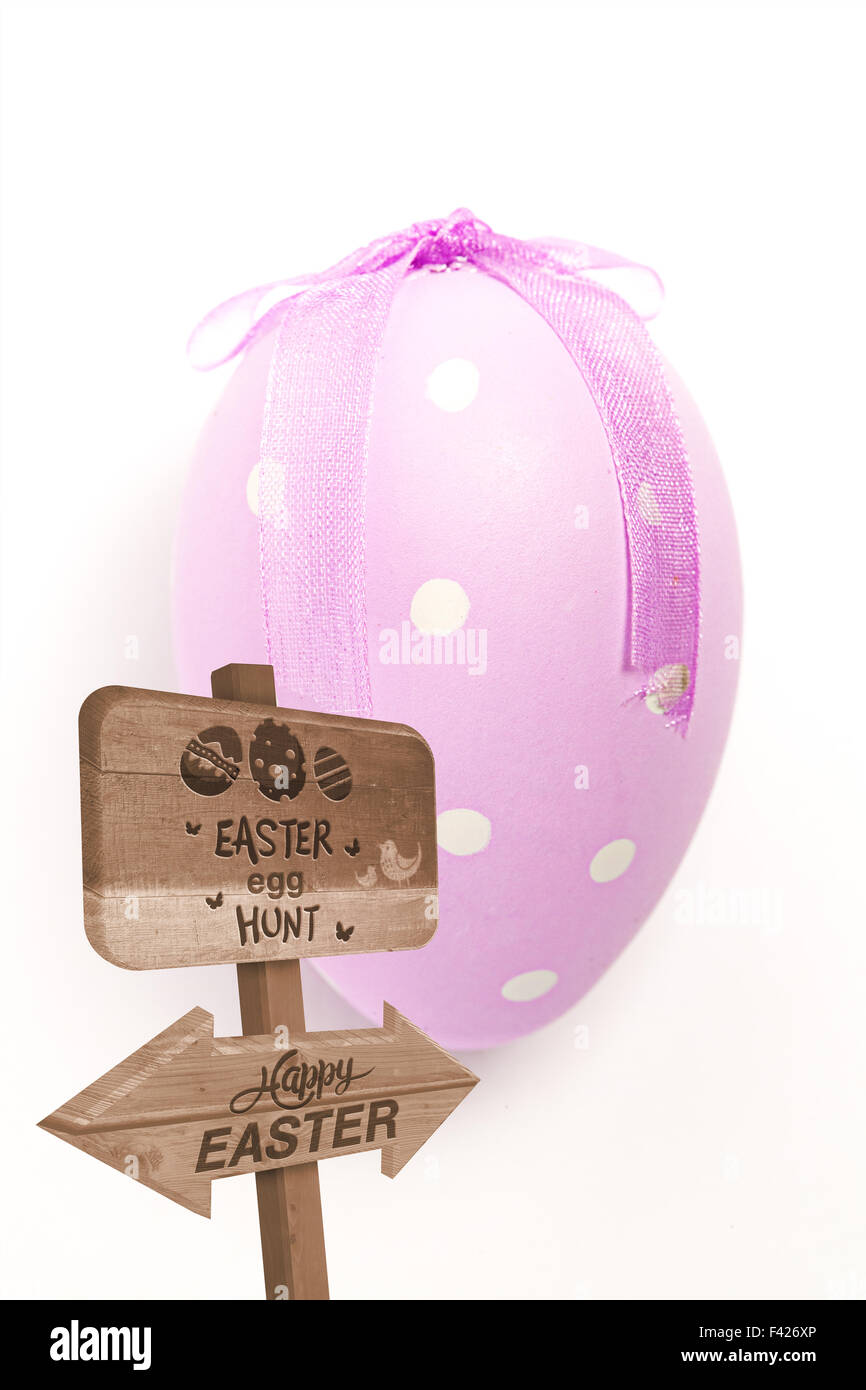 Composite image of easter egg hunt sign Stock Photo - Alamy