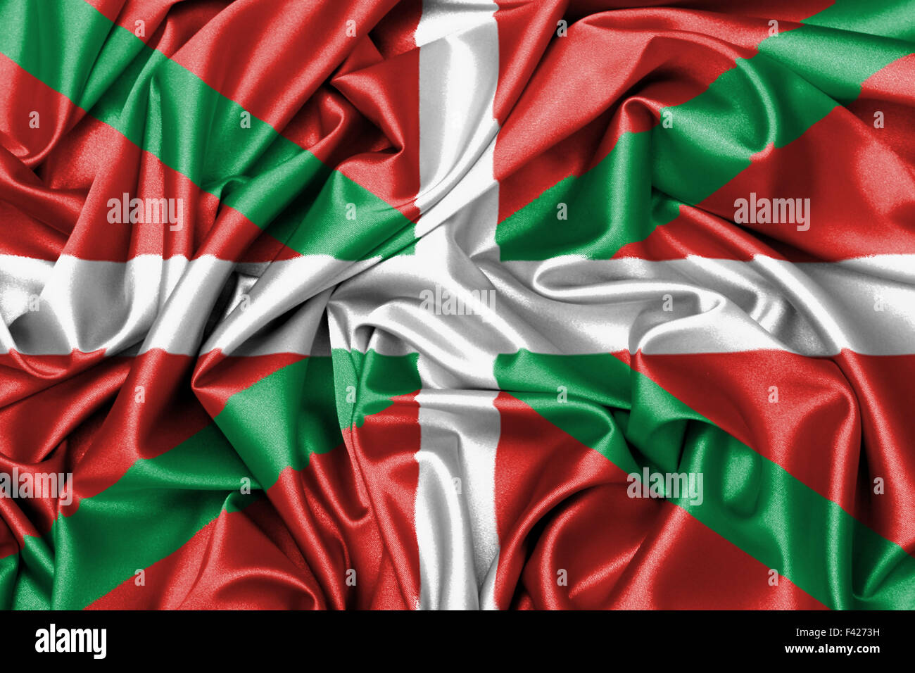 Large satin flag waving - flag of Basque Country Stock Photo - Alamy