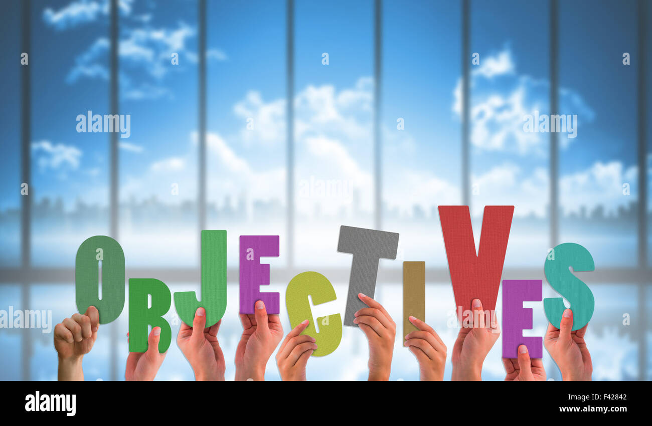 Composite image of hands showing objectives Stock Photo - Alamy