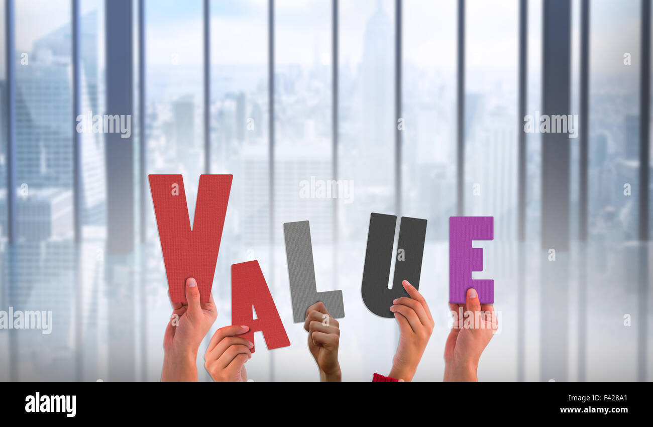 Composite image of hands holding up value Stock Photo - Alamy