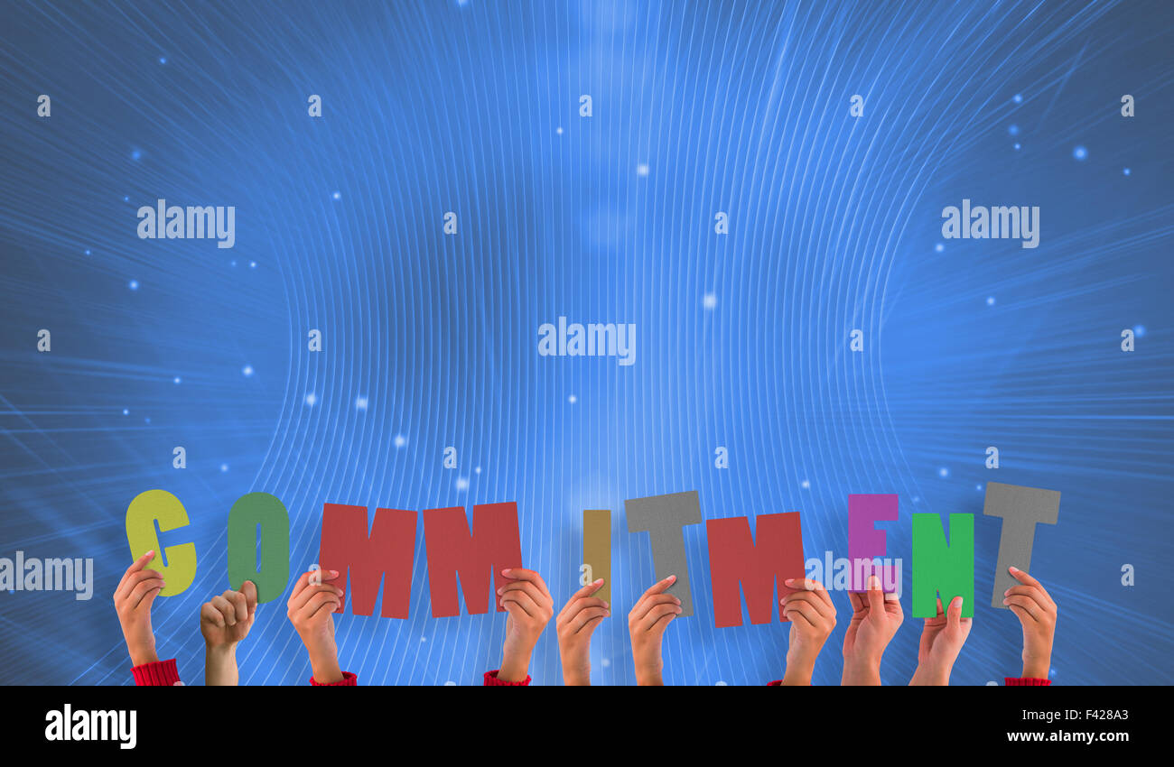 Composite image of hands showing commitment Stock Photo - Alamy