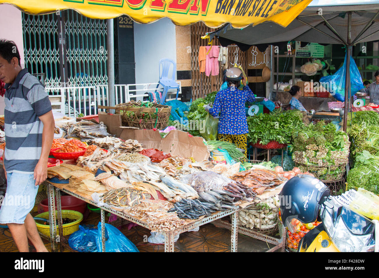 fish stall vendor in the markets of Can Tho, the largest city in the ...