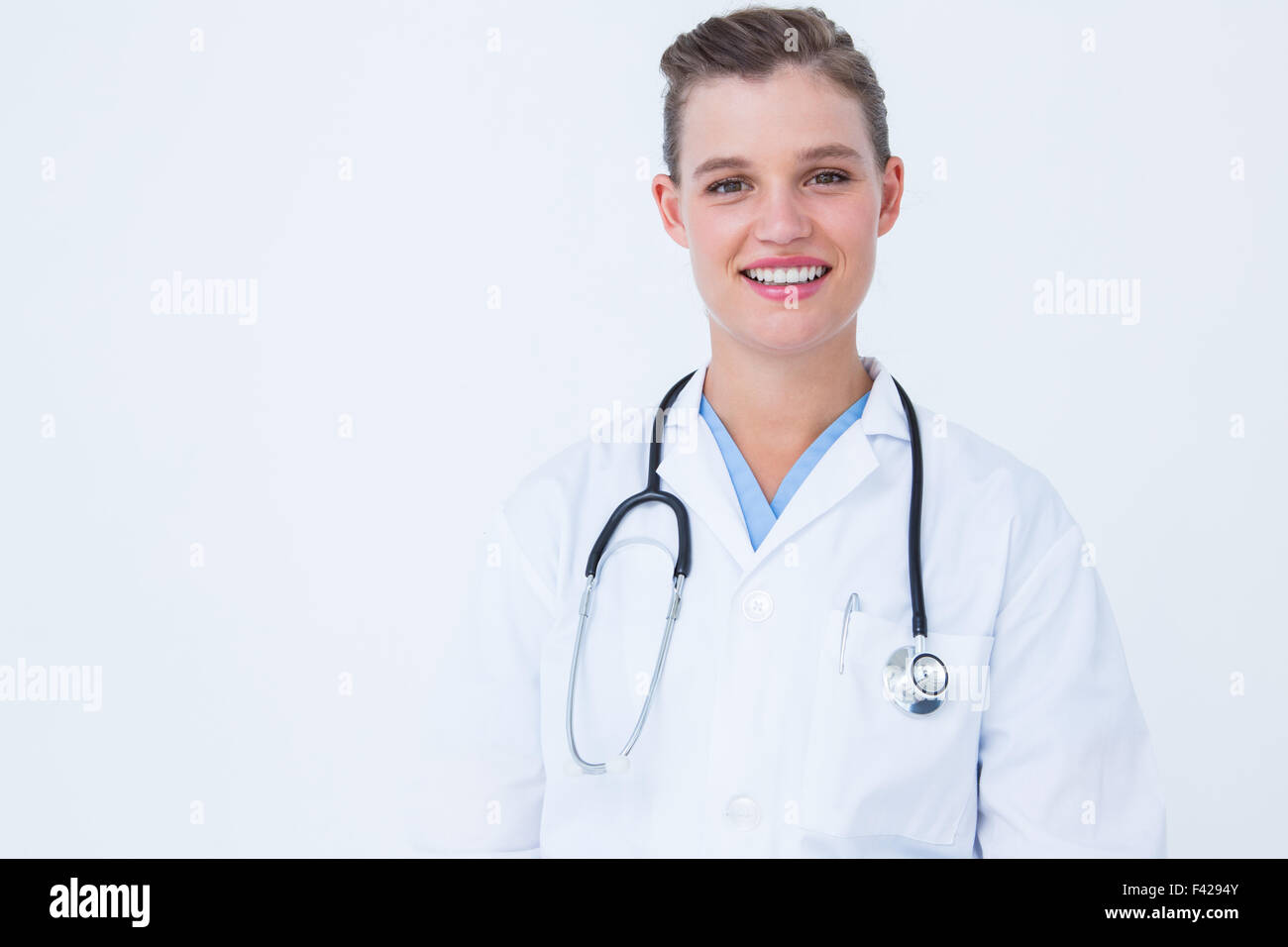 Happy doctor smiling at camera Stock Photo - Alamy