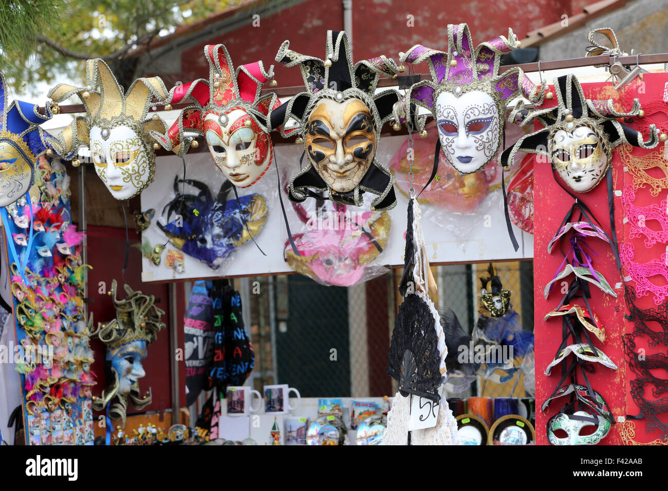 Traditional Venetian face masks on an open air stall in Venice Italy ...