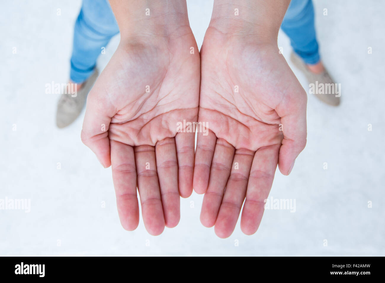 Woman showing her hands Stock Photo - Alamy
