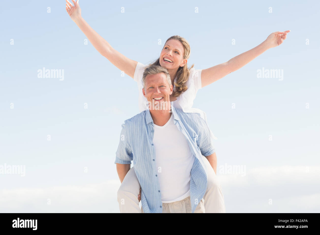 Happy couple having fun together Stock Photo - Alamy