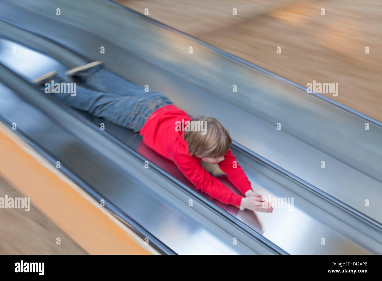 Boy (9 10) on slide hi-res stock photography and images - Alamy