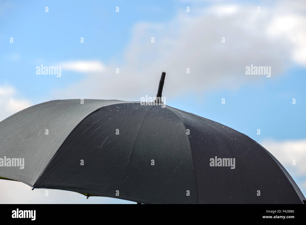 Black umbrella hi-res stock photography and images - Alamy