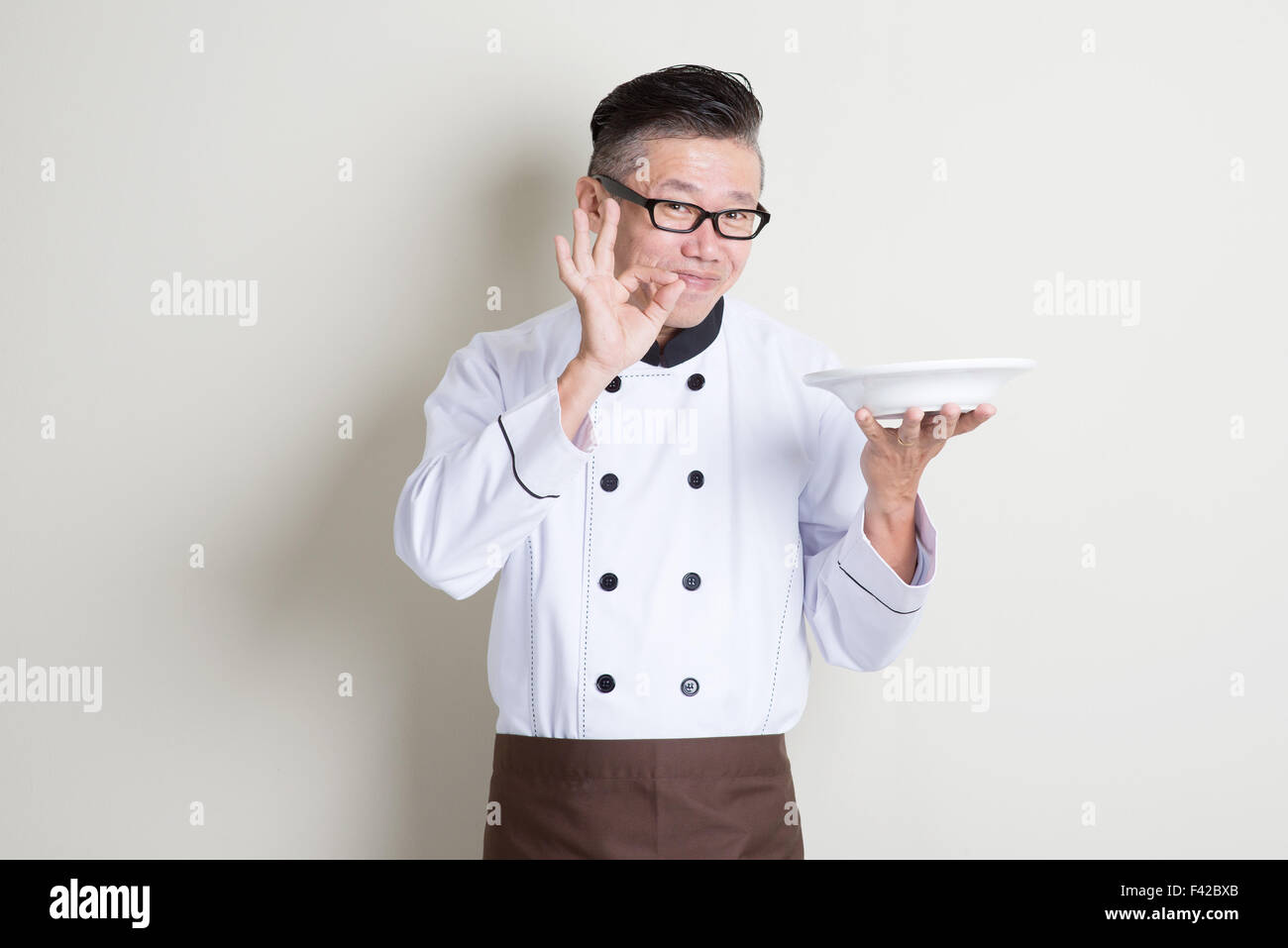 Professional asian cook showing hi-res stock photography and images - Alamy