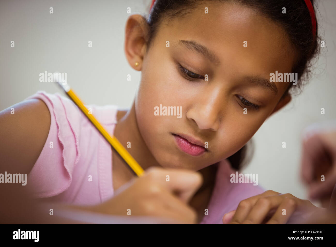 Hard working pupil school hi-res stock photography and images - Alamy
