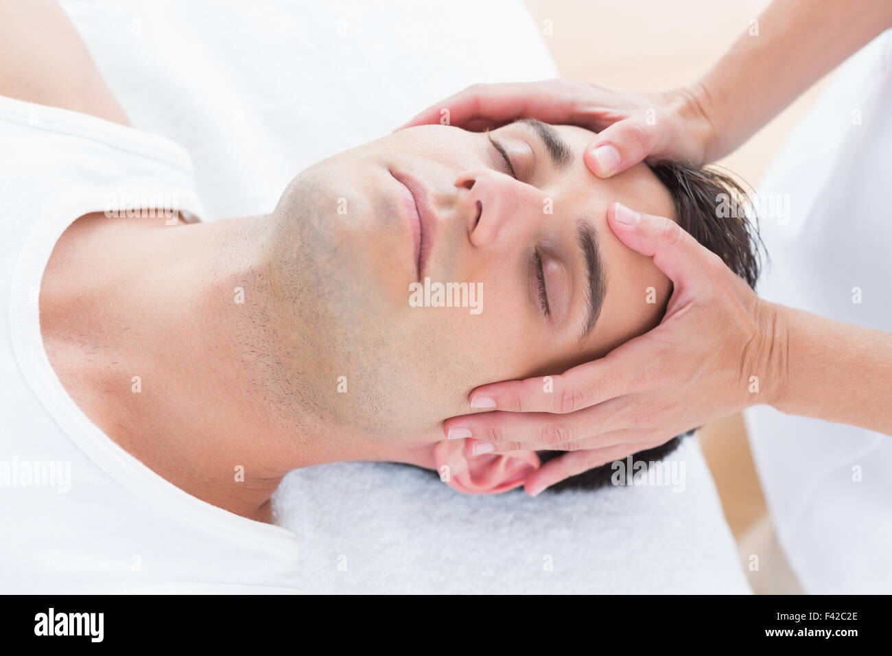 Man receiving head massage Stock Photo - Alamy