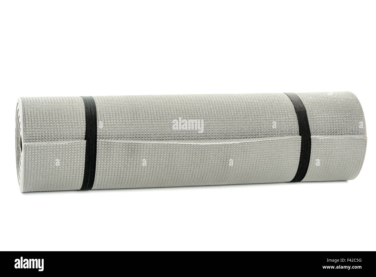 Multipurpose mat rolled up and secured Stock Photo - Alamy