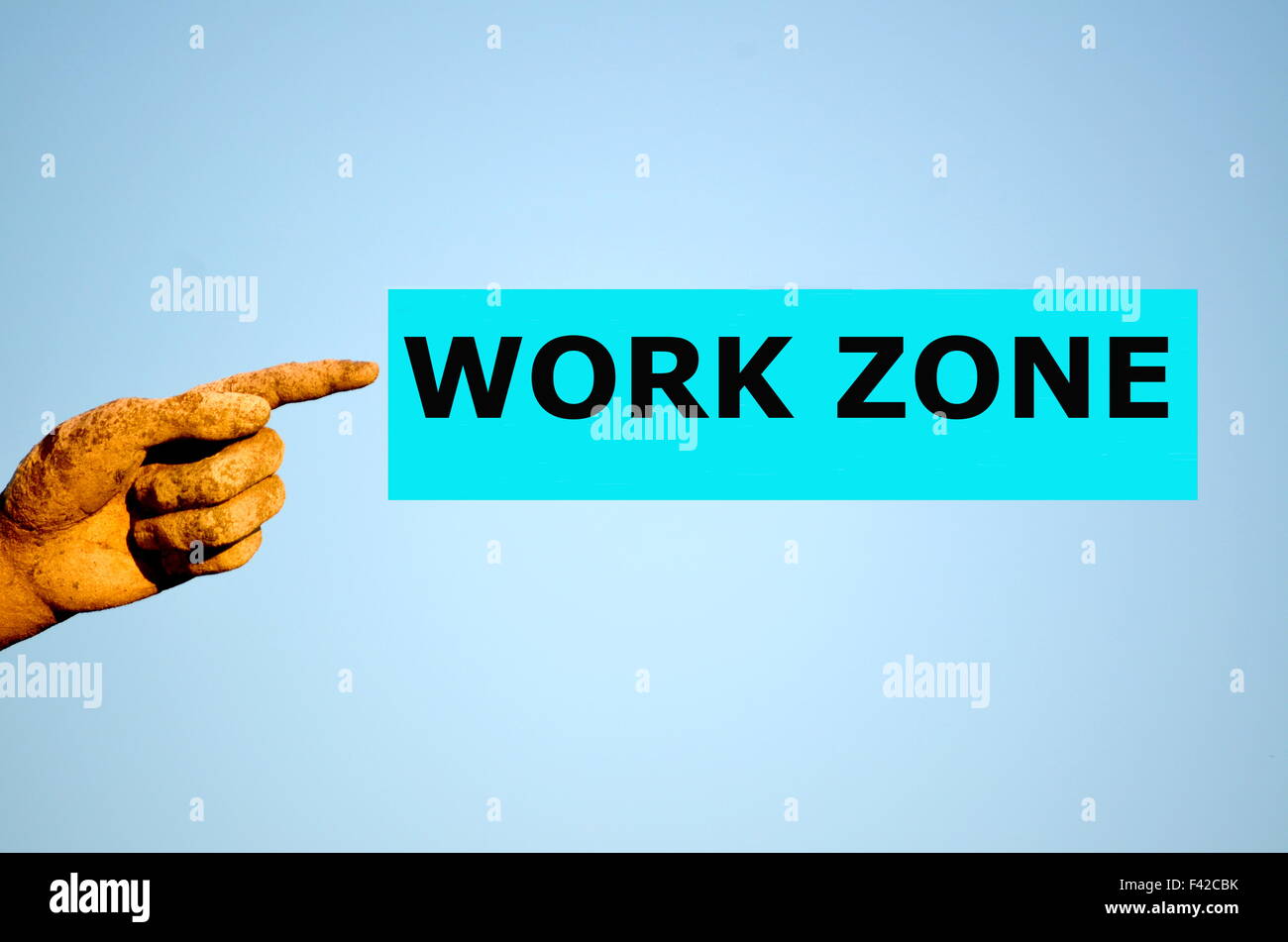 finger with rectangular light blue label WORK ZONE Stock Photo - Alamy