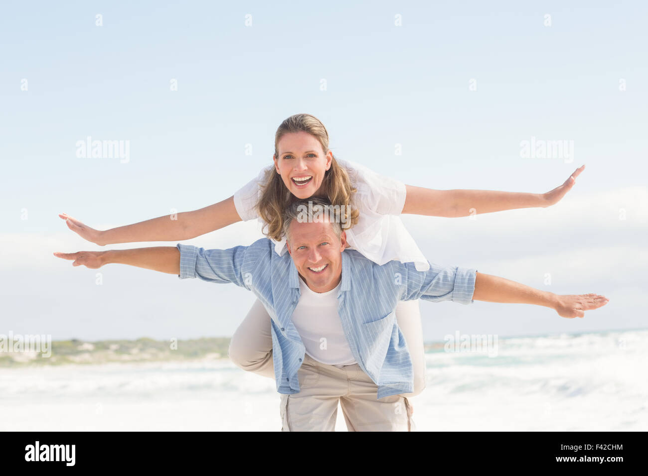 Happy couple having fun together Stock Photo - Alamy