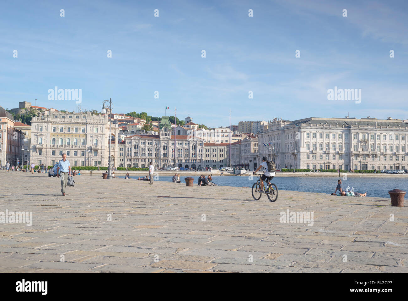 Molo audace Trieste, view in summer of people relaxing on the immense ...