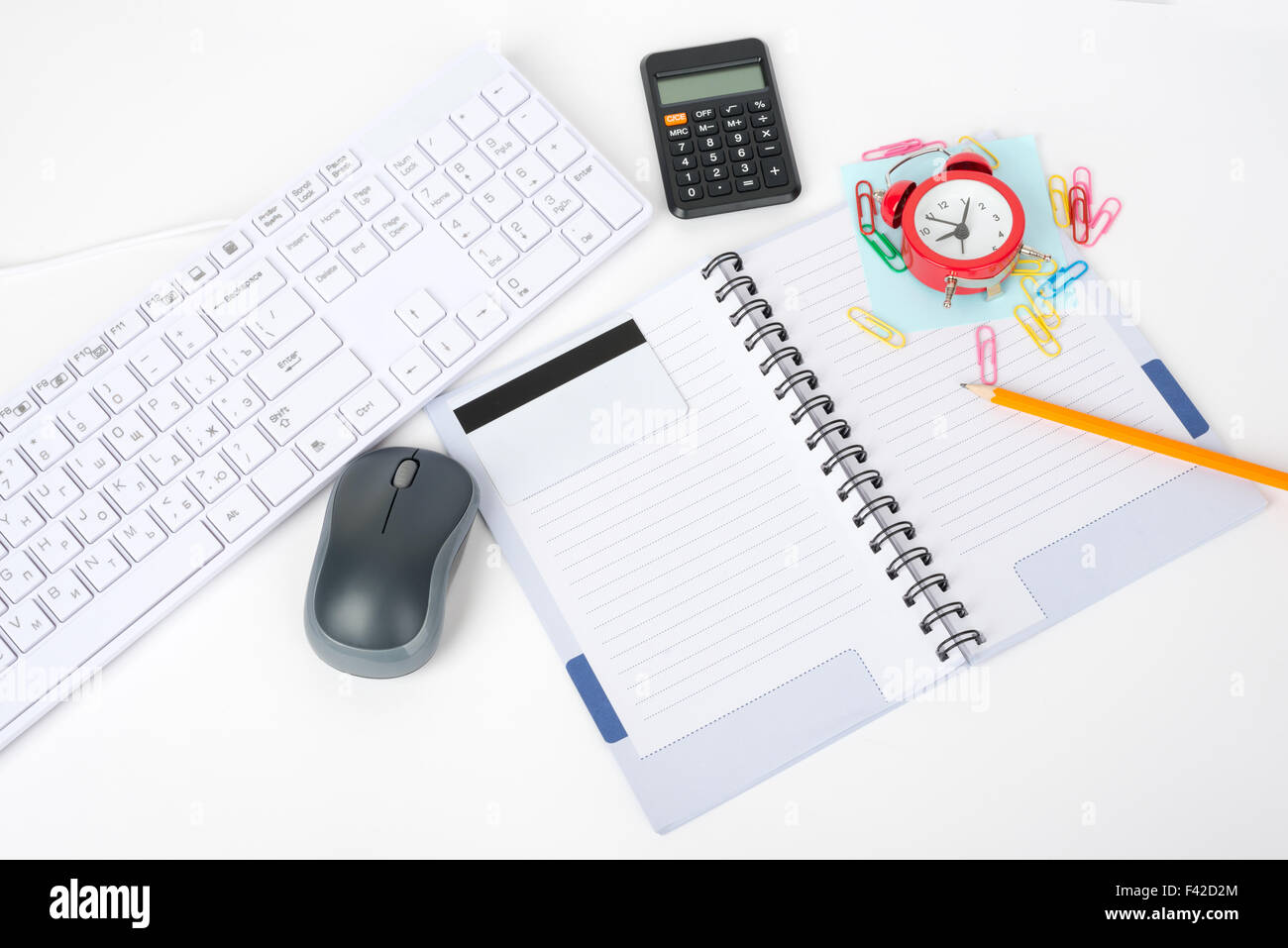 Keyboard with alarm clock and calculator Stock Photo - Alamy