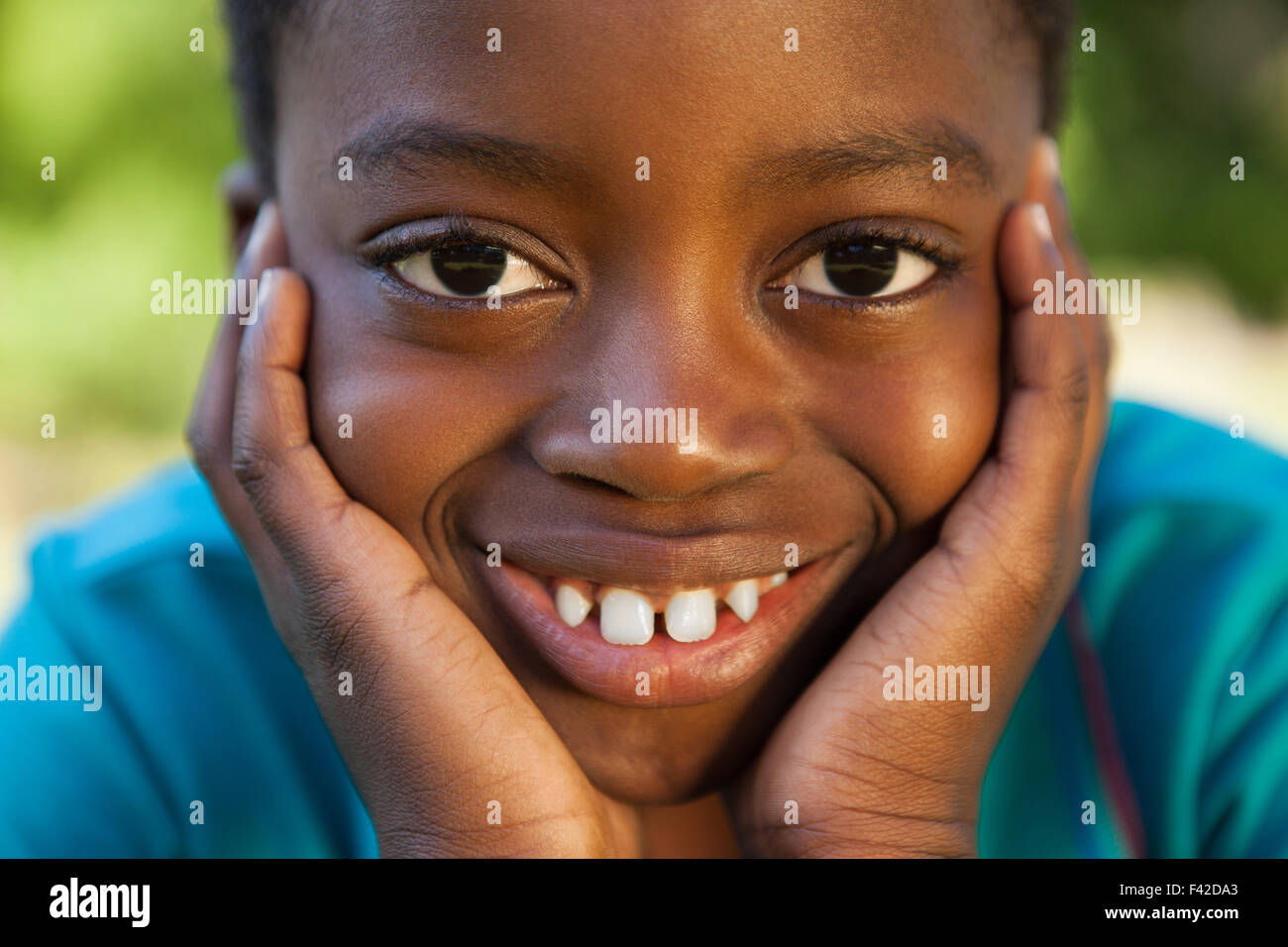 Little boy smiling at camera Stock Photo - Alamy