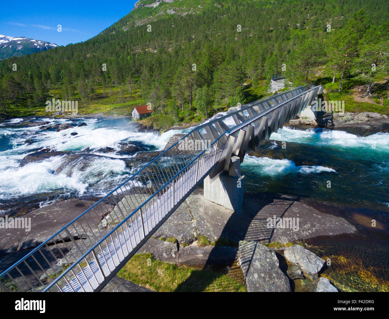 Bridge across Likholefossen waterfalls in Norway, popular tourist ...