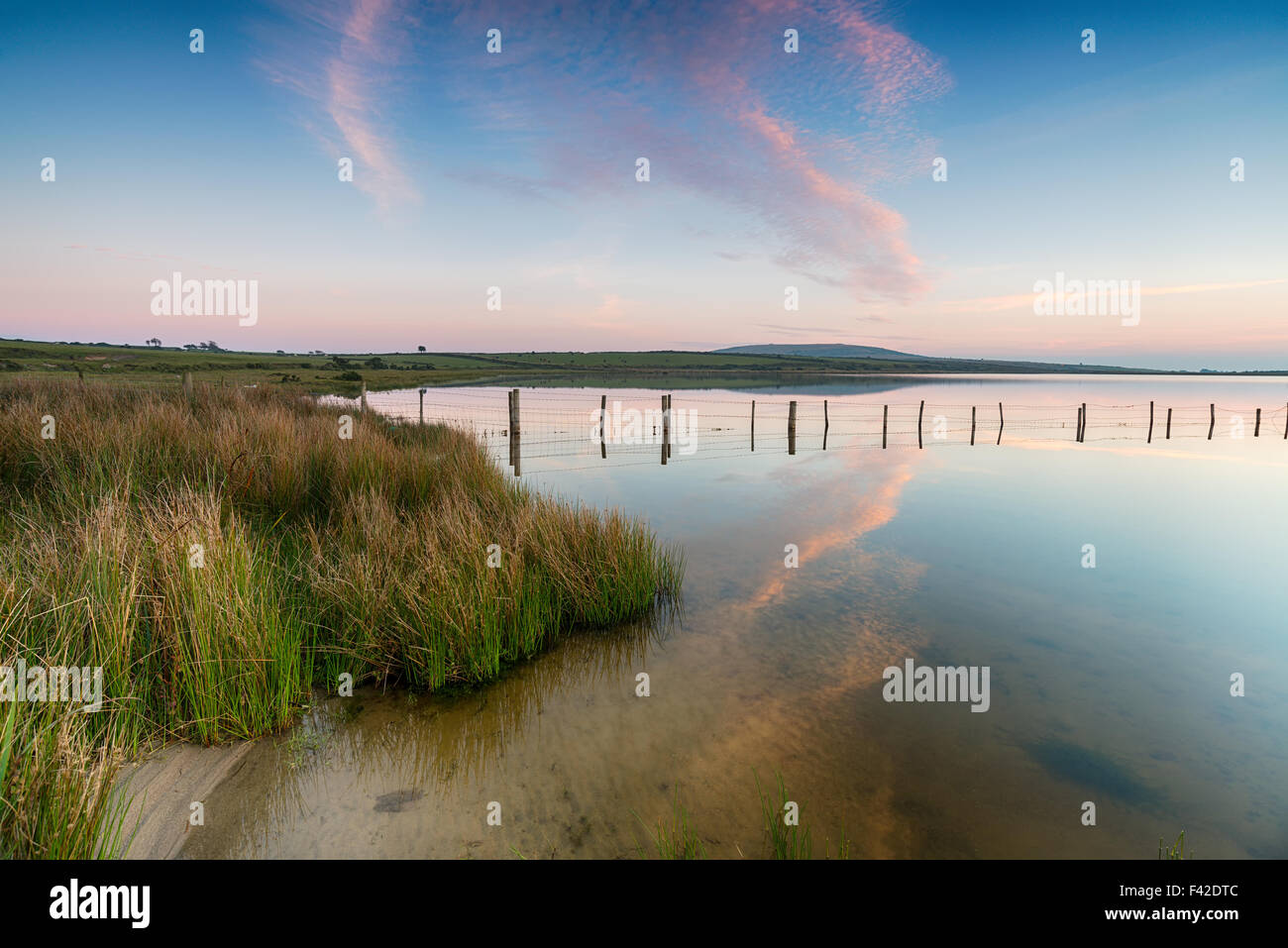 Sunset at Dozmary Pool on Bodmin Moor in Cornwall Stock Photo - Alamy
