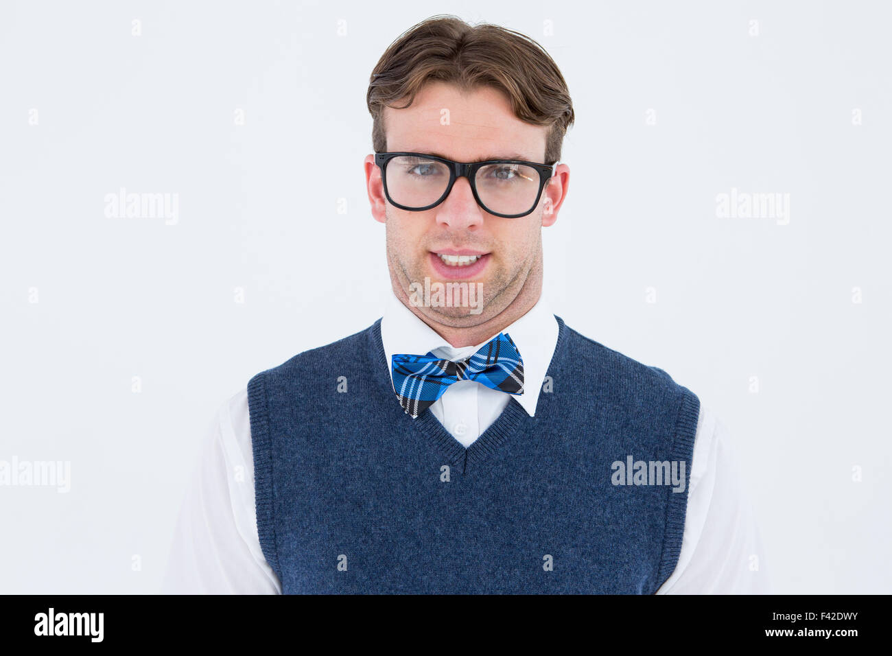 Geeky hipster looking at camera Stock Photo - Alamy