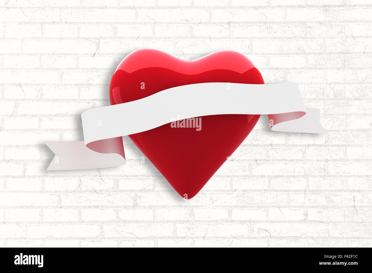 Composite image of heart with scroll Stock Photo - Alamy