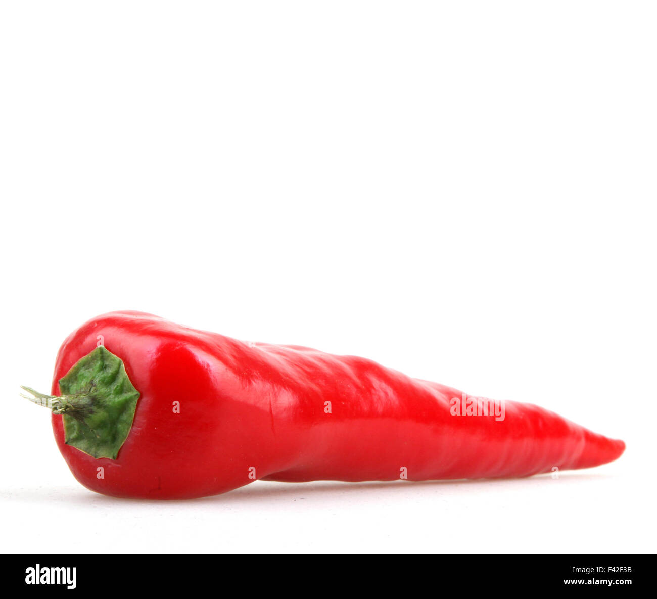 Red pepper on white background Stock Photo - Alamy