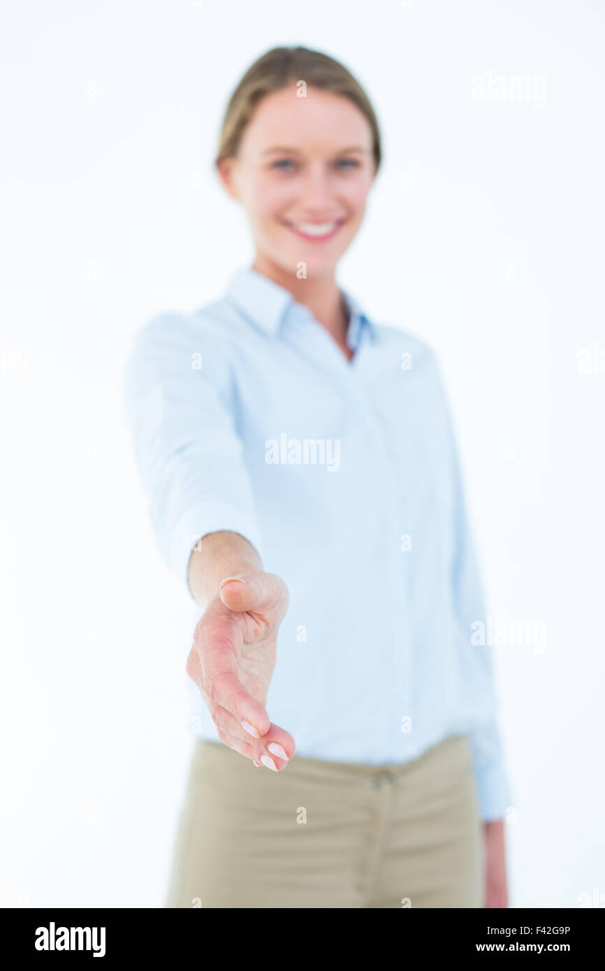 Smiling businesswoman offering handshake Stock Photo - Alamy